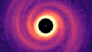 Este planeta pode ser responsável por espiral em disco protoplanetário ...