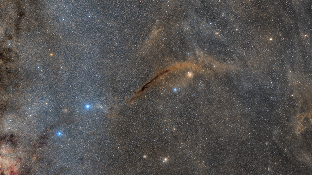 Destaque da NASA: nebulosa escura "curvada" está na foto astronômica do dia - Canaltech
